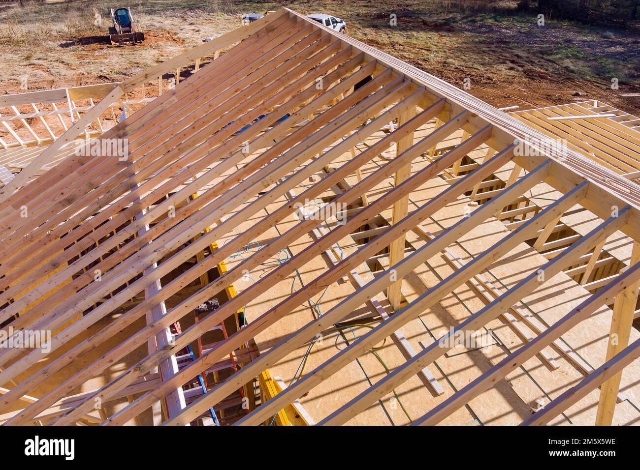 Process of constructing wooden roof beam for newly built home stick ...