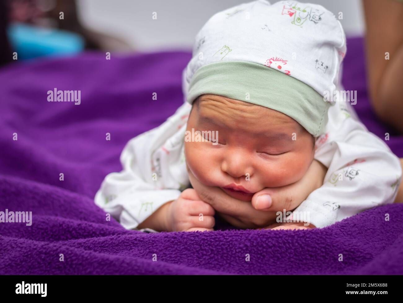newborn baby isolated sleeping at mother palm from flat angle Stock ...