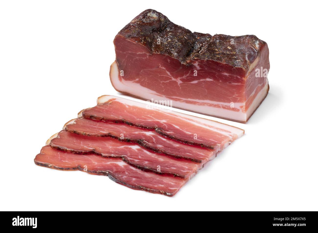 Traditional german smoked bacon, Sudtiroler Speck, and slices close up ...