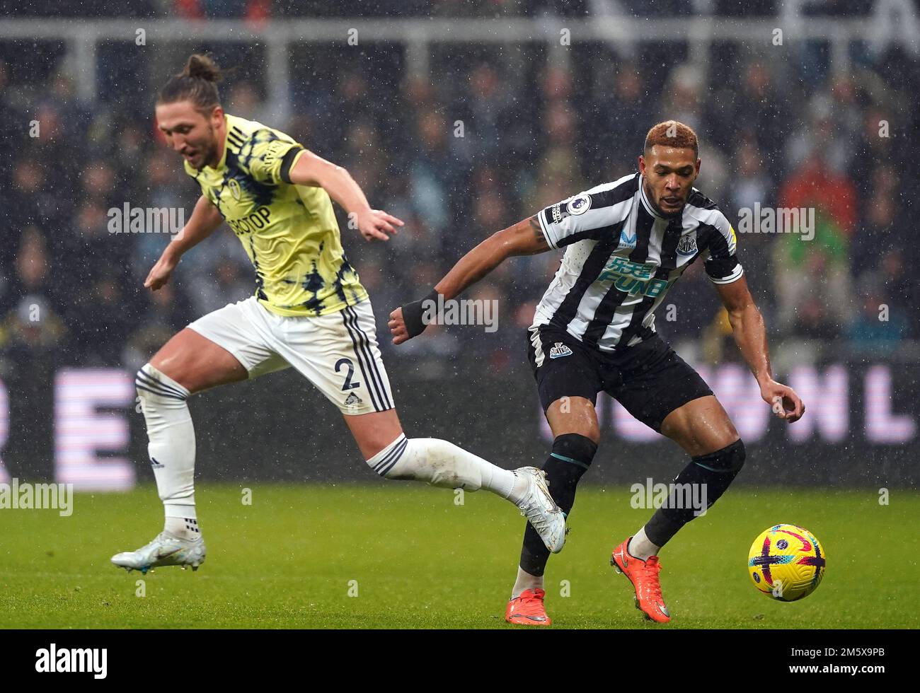 Leeds United's Luke Ayling and Newcastle United's Joelinton during the ...