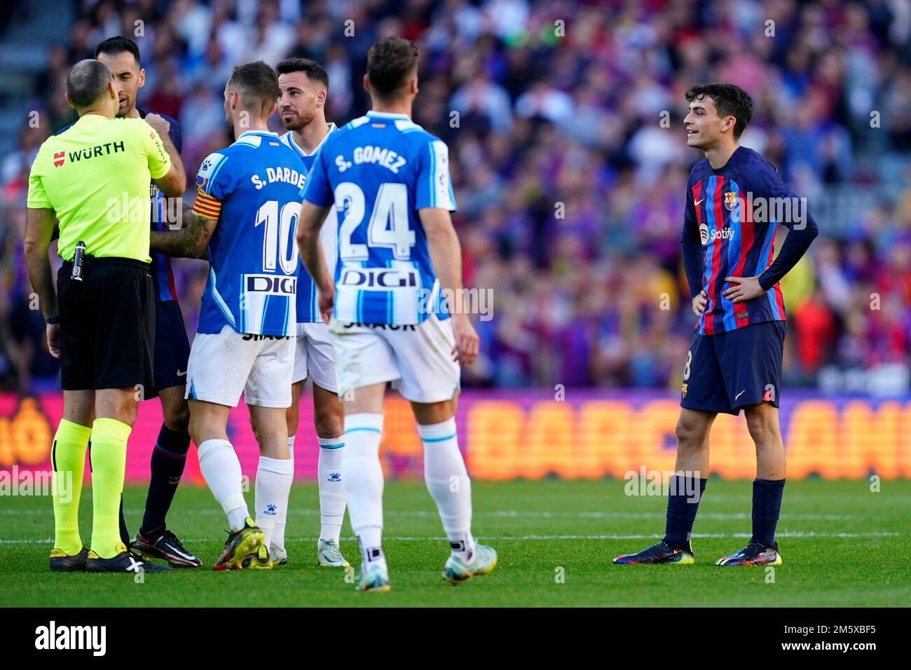 Players protest to the referee during the La Liga match between FC ...