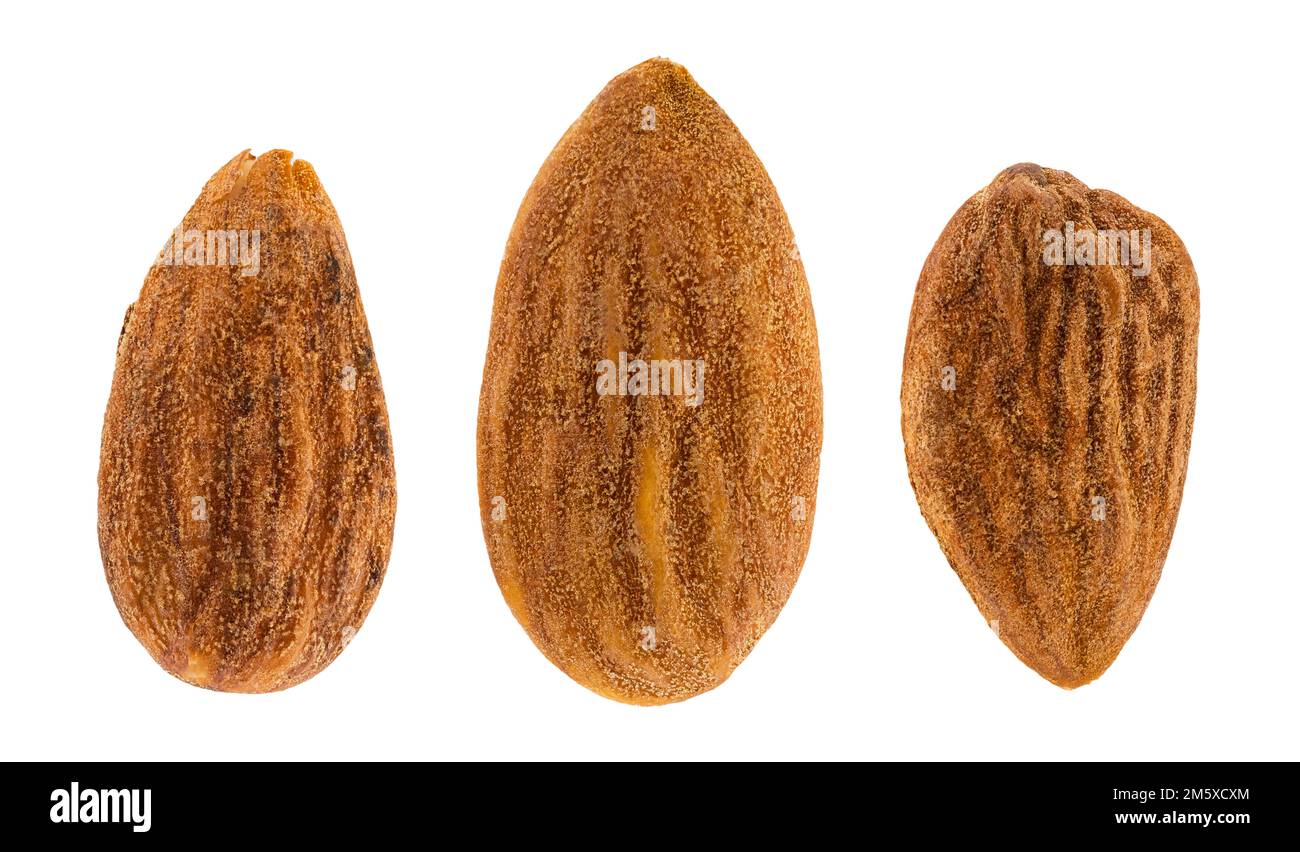 Three almonds nuts isolated on white Stock Photo - Alamy