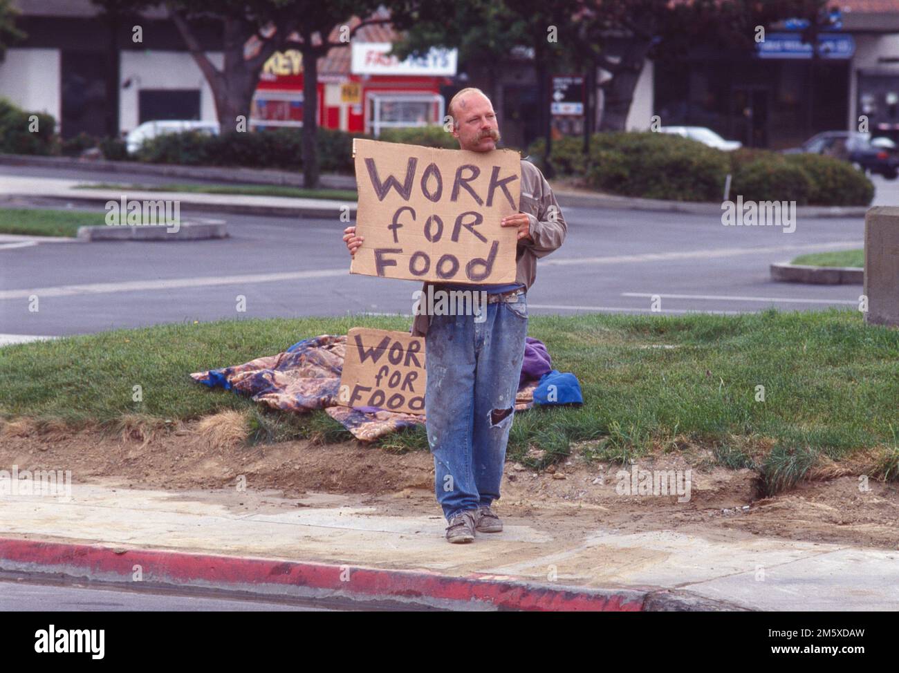 Homeless Holding Sign