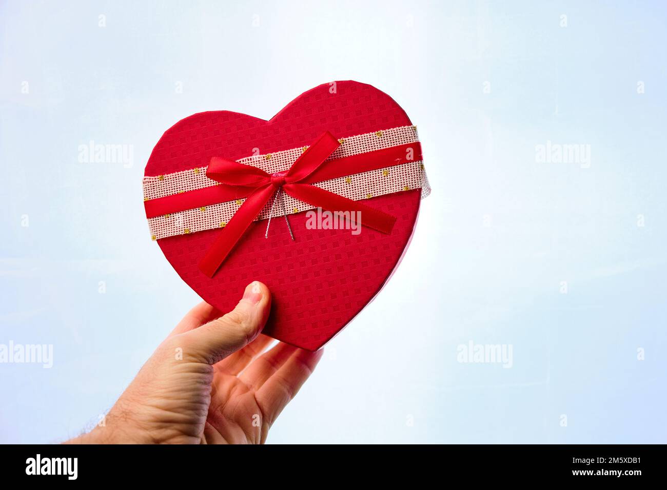 Close up hand giving gift hi-res stock photography and images - Alamy
