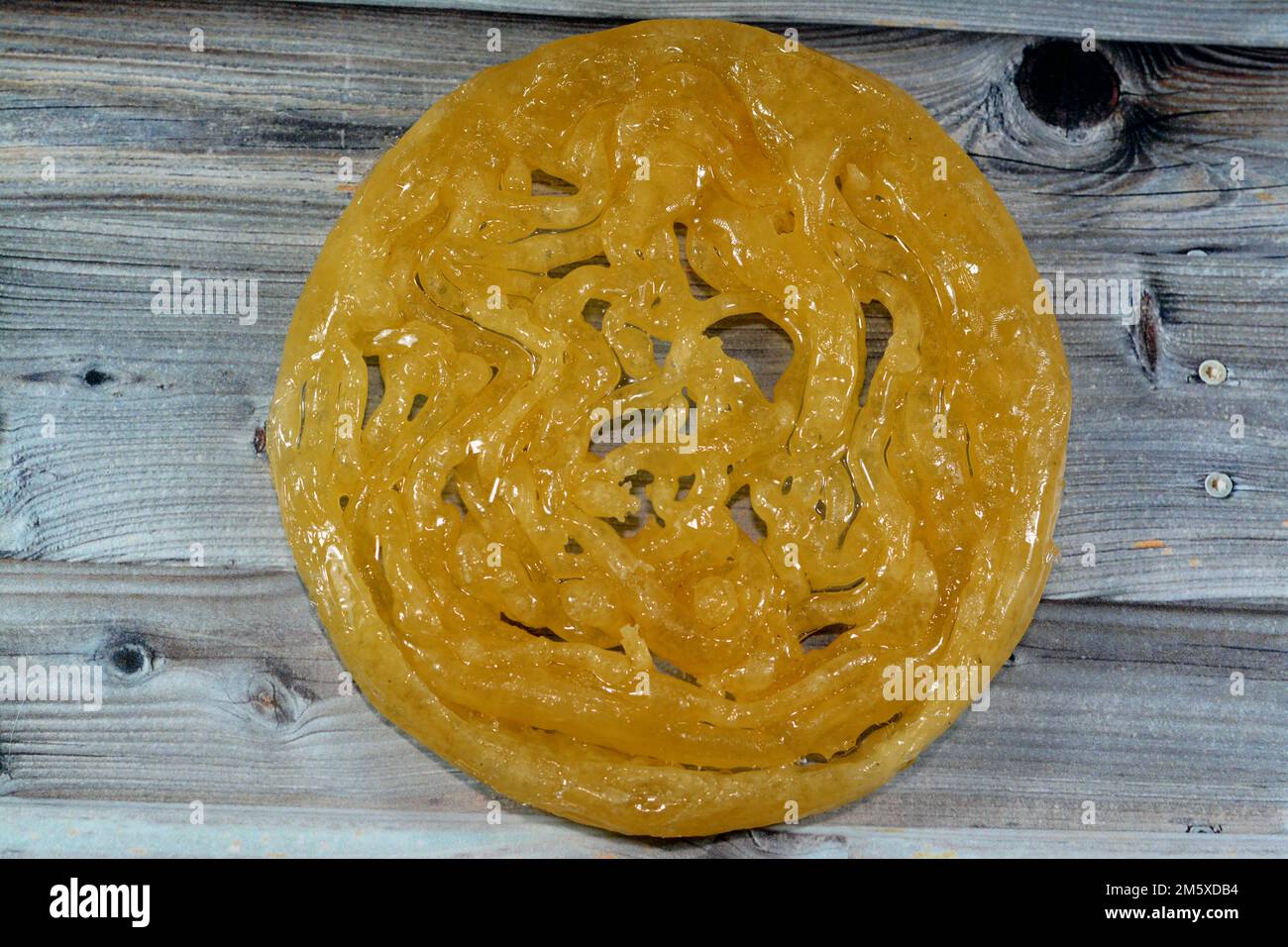 Egyptian Meshabek, It is a rounded sweet made of a deep-fried crunchy ...