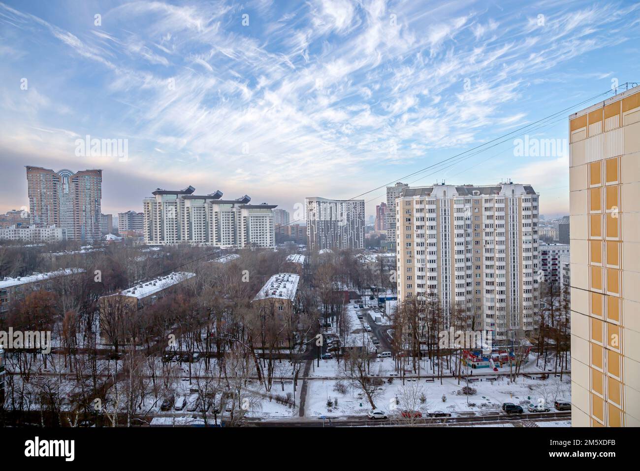 Residential area of Moscow on winter evening, against a beautiful sky ...