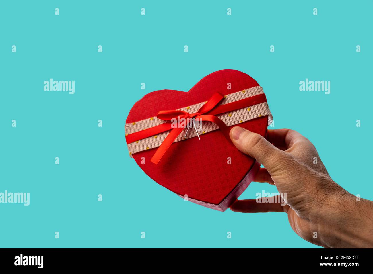 Hand offering heart symbol hi-res stock photography and images - Alamy