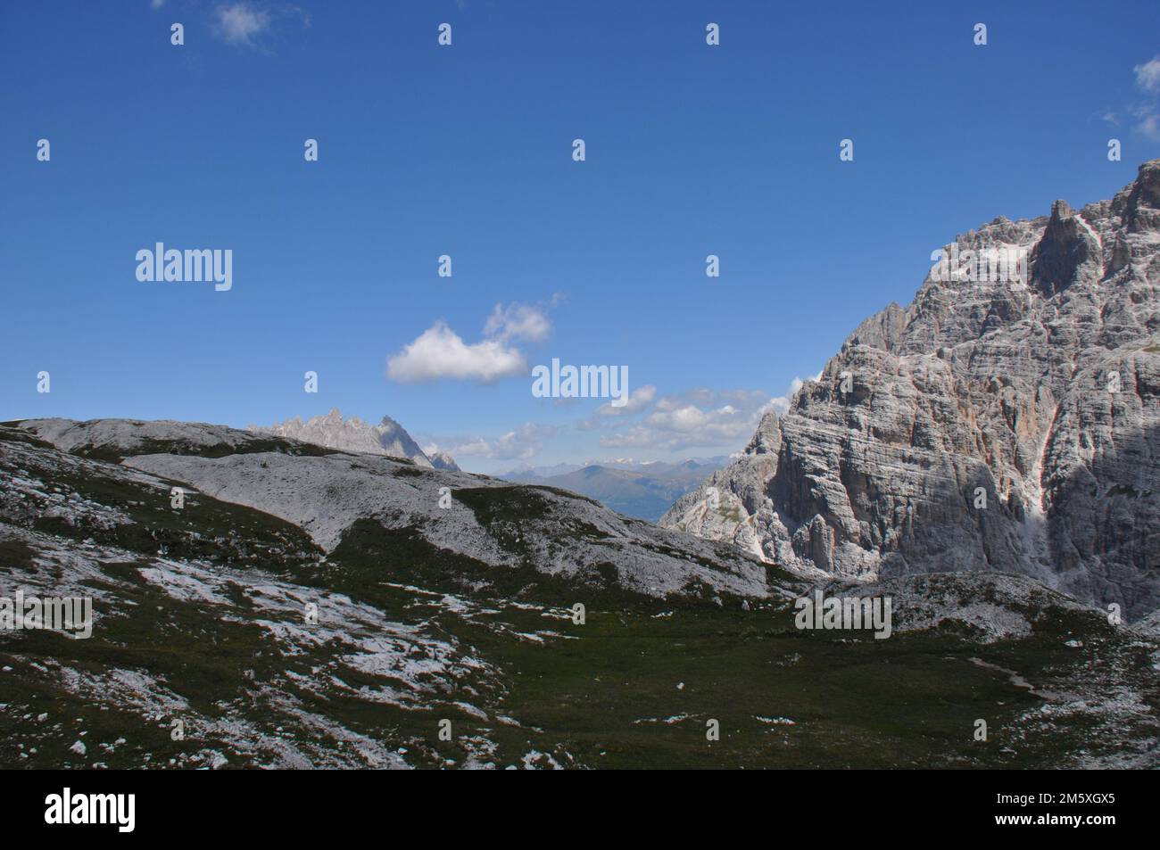 A landscape of Silberen range mountains with blue cloudy sky in ...