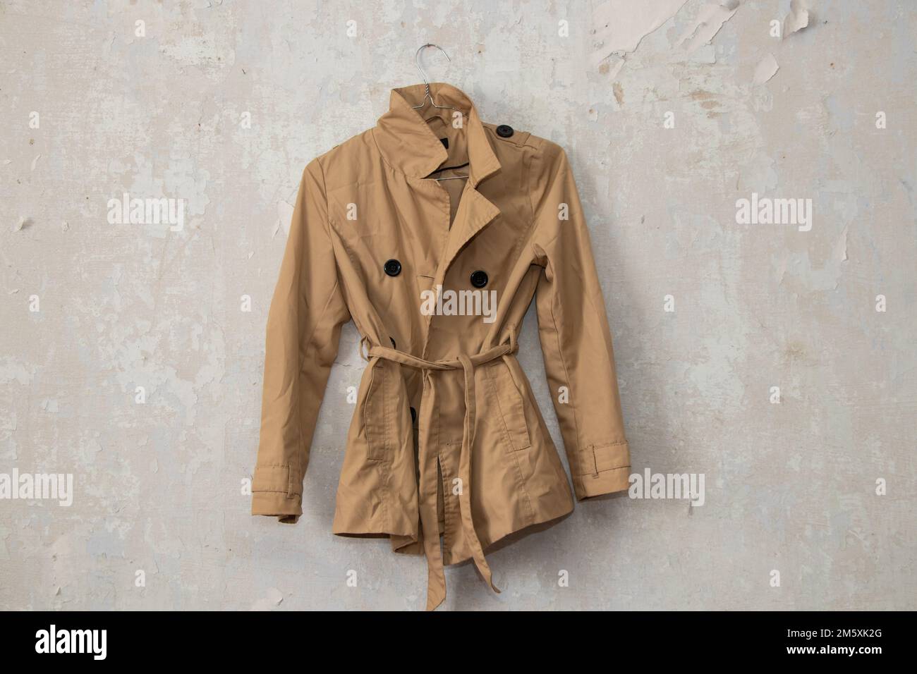 Raincoat hanging hi-res stock photography and images - Alamy