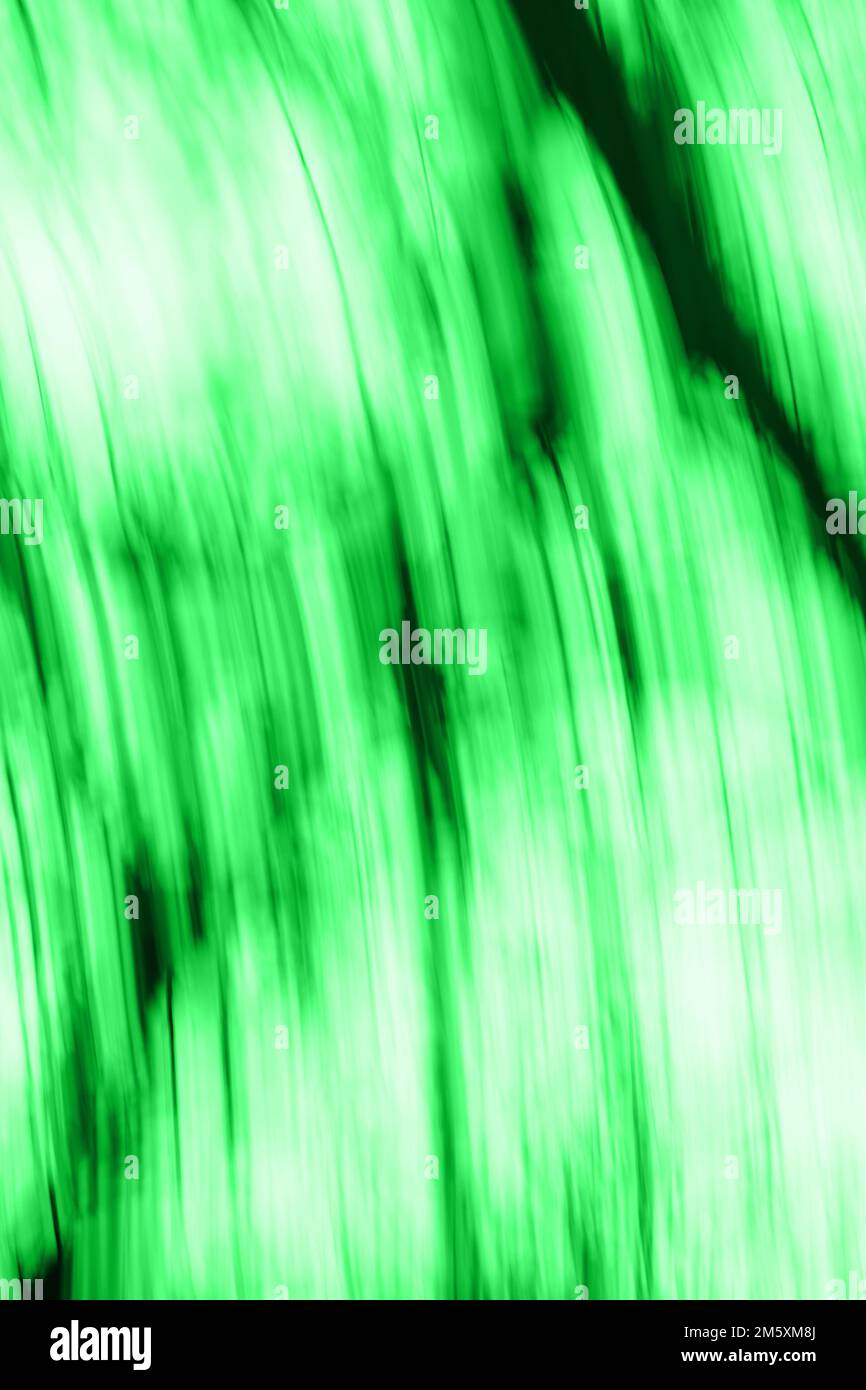 Natural green blurry defocused dynamic abstract background. Green fast ...