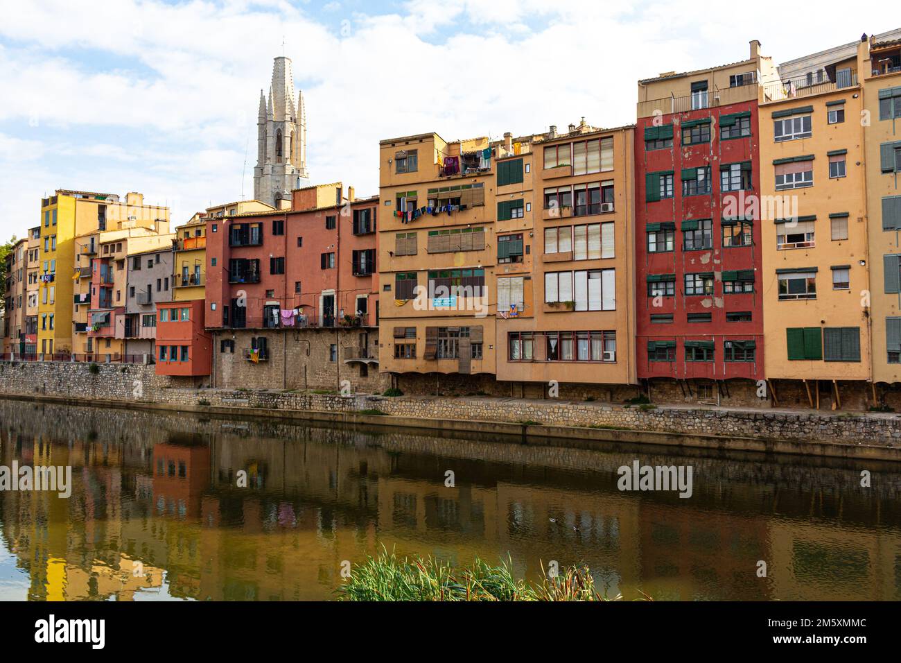 Looking down the river Onyar in the medieval Catalonian city of Girona ...