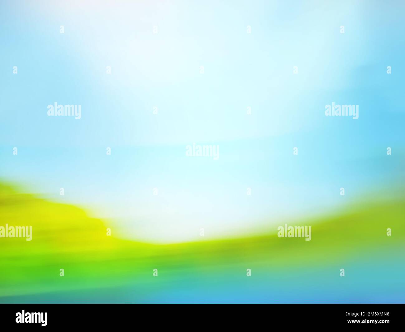 Spring landscape with meadows in the sunlight defocus blurred backdrop ...