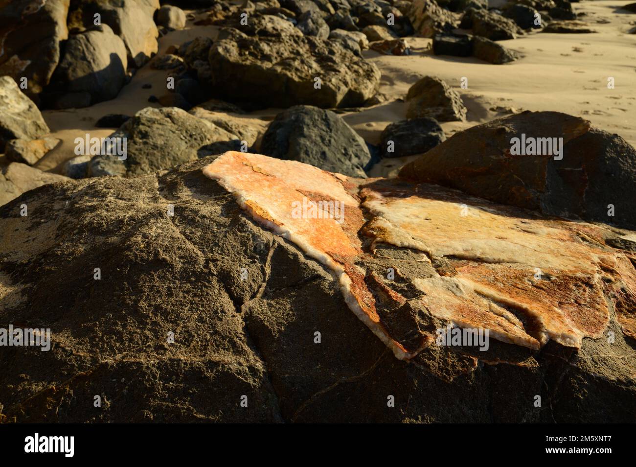 Geological formation of colorful stones with different layers, yellow ...