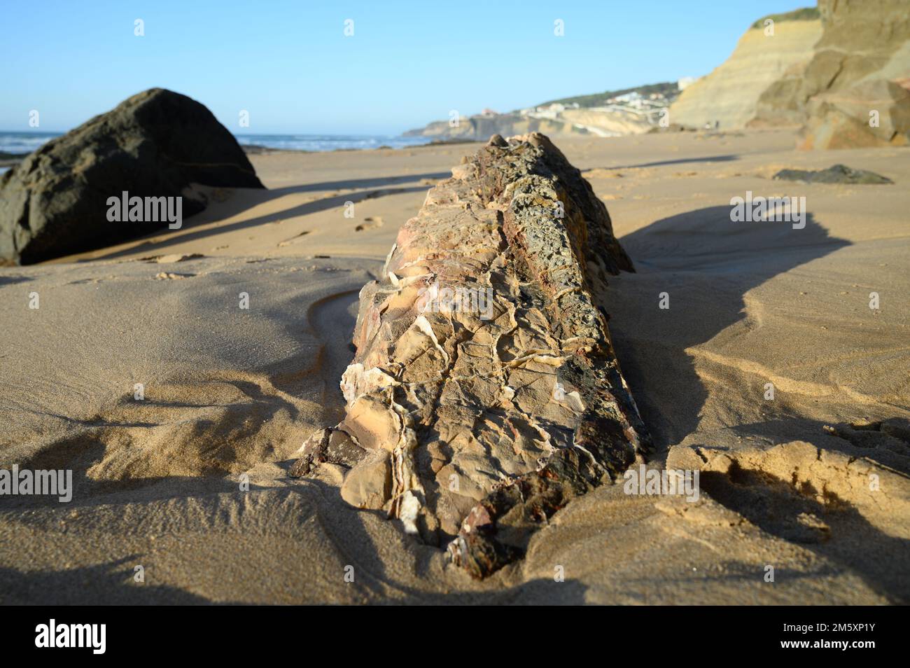 Geological formation of colorful stones with different layers, yellow ...