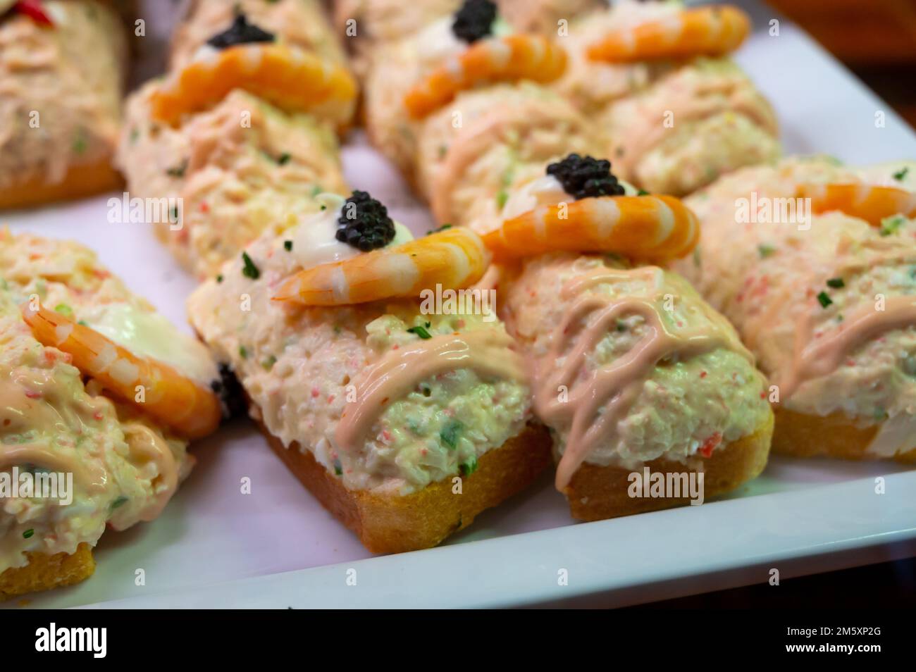 Typical mini burger snack of Basque Country, pinchos or pinxtos, small ...