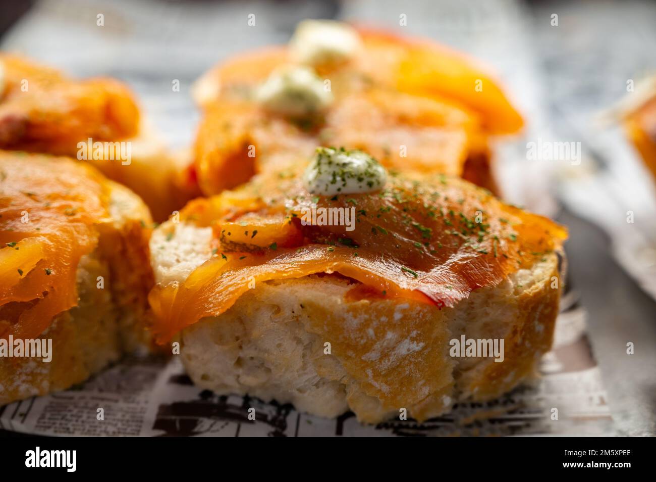 Typical snack of Basque Country, pinchos or pinxtos skewers with small ...