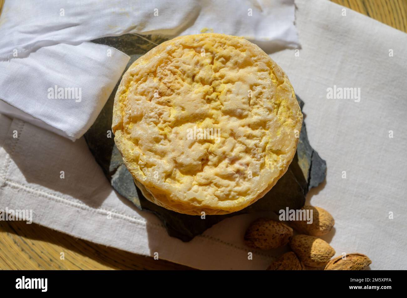 Tasting of local portuguese matured cheese queijo serpa, Setubal area ...