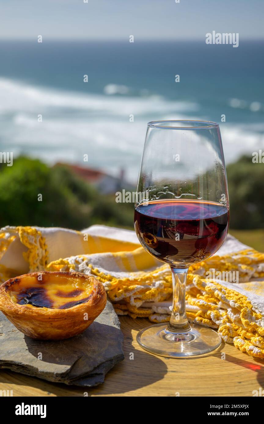 Portugal's traditional food and drink, glass of porto wine and sweet ...
