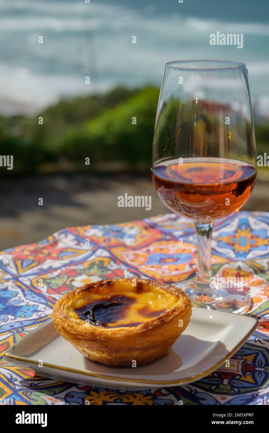 Portugal's traditional food and drink, glass of porto wine or muscatel ...