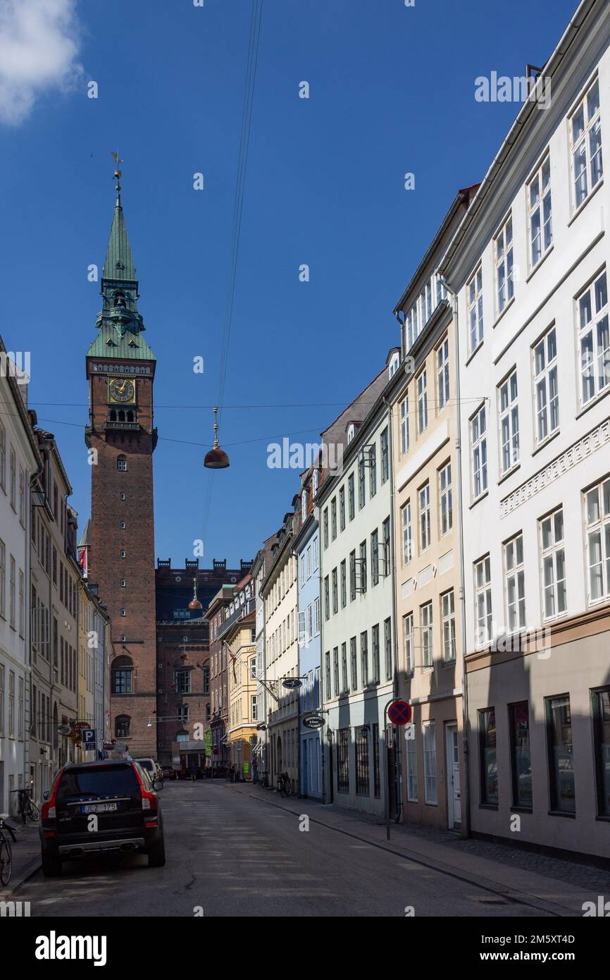 A vertical shot of the Copenhagen City Hall clock tower and the ...