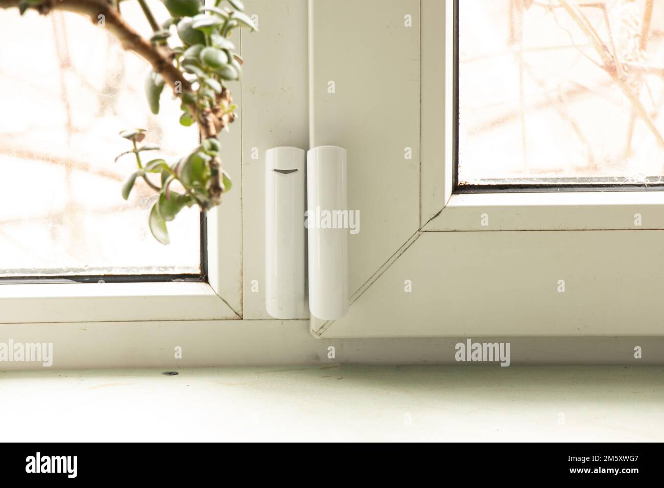 window opening sensor hanging on the window, home alarm system, home ...
