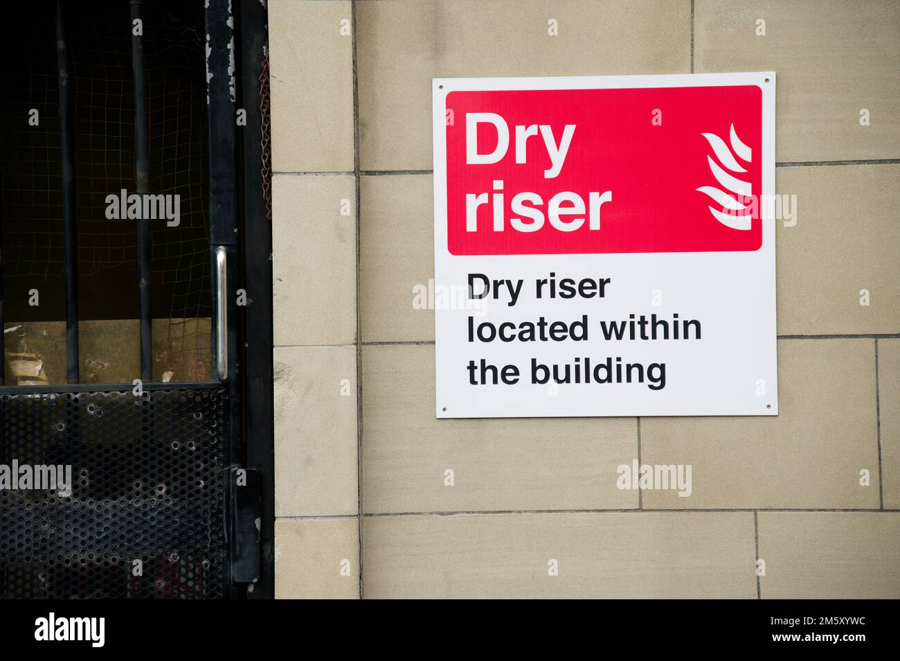 Dry riser located within the building sign Stock Photo - Alamy