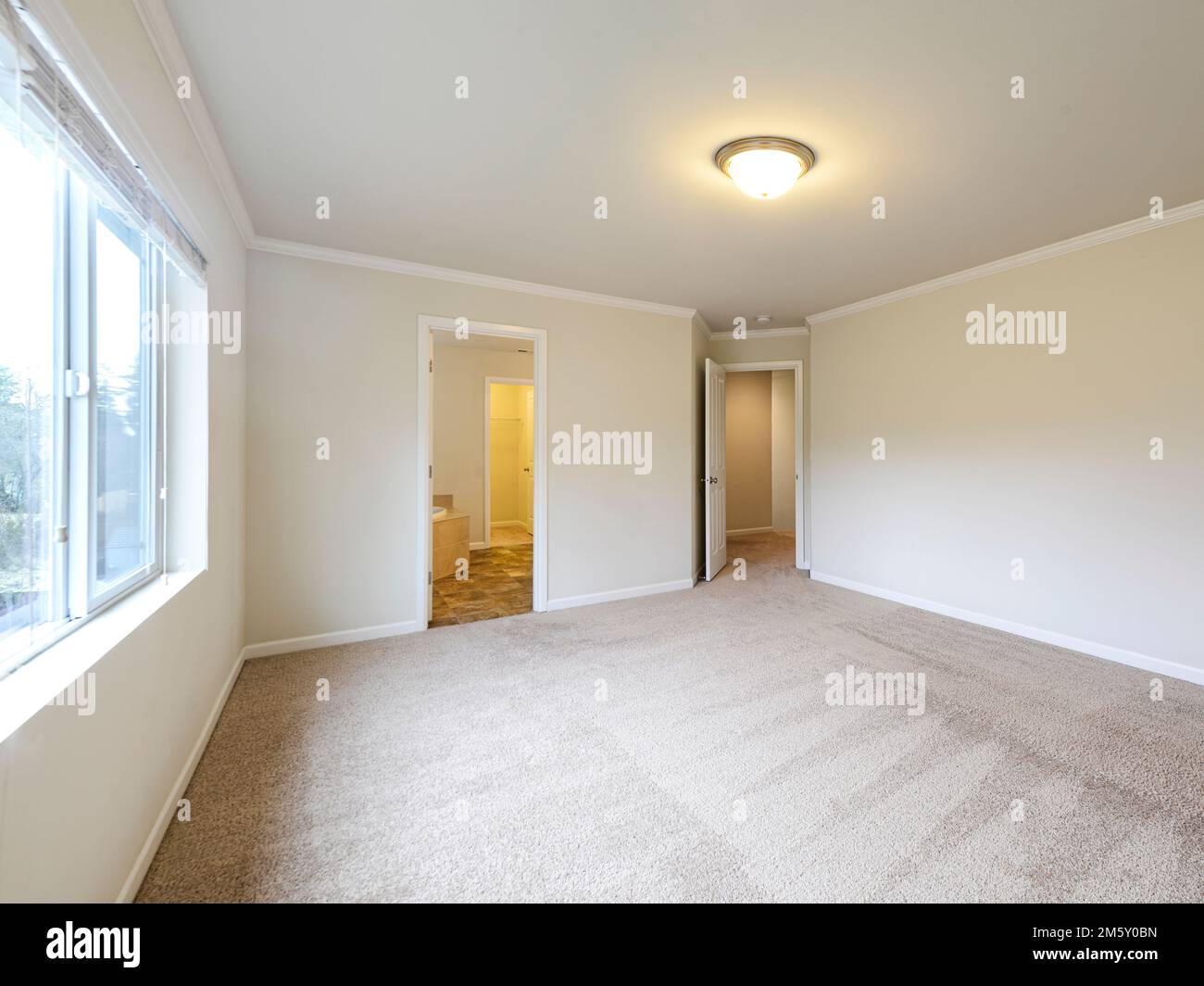 Modern residential empty bedroom interior Stock Photo - Alamy