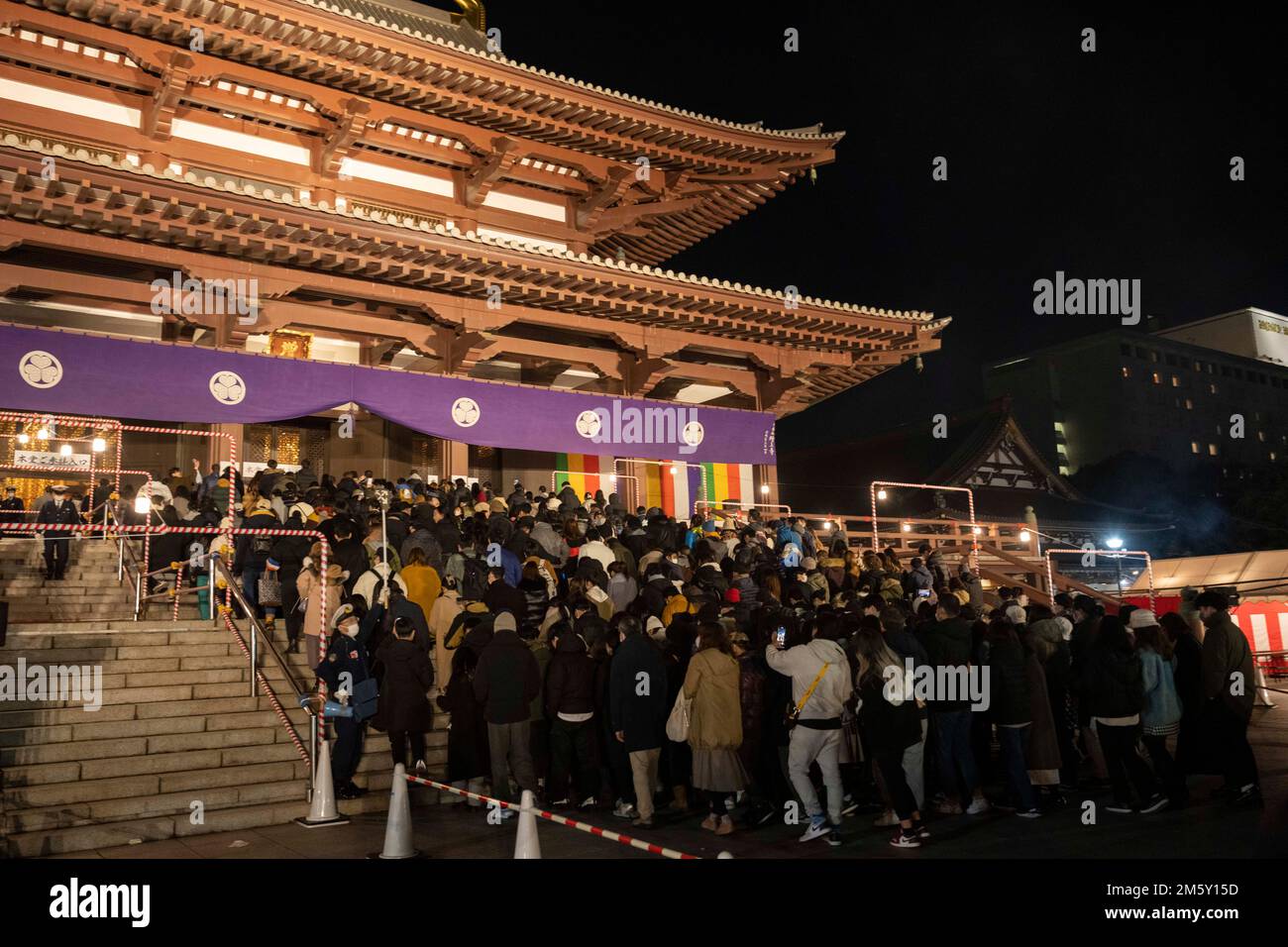 Tokyo, Japan. 1st Jan, 2023. New Years 2023 revelers wait to pray at ...