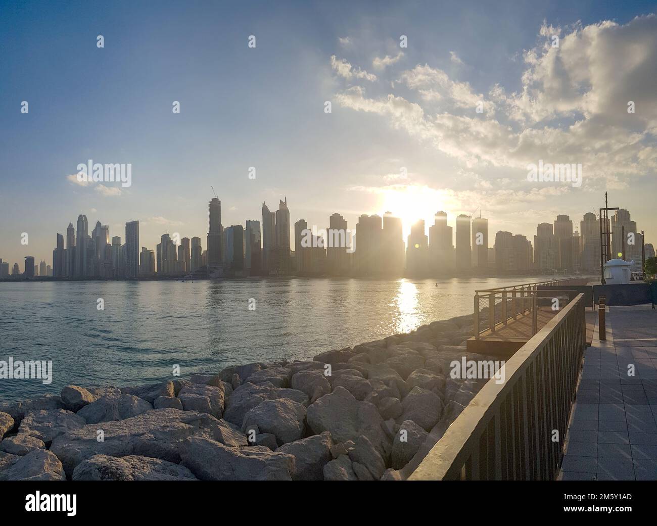 Panoramic view of Business Bay district with reflection in sea in ...