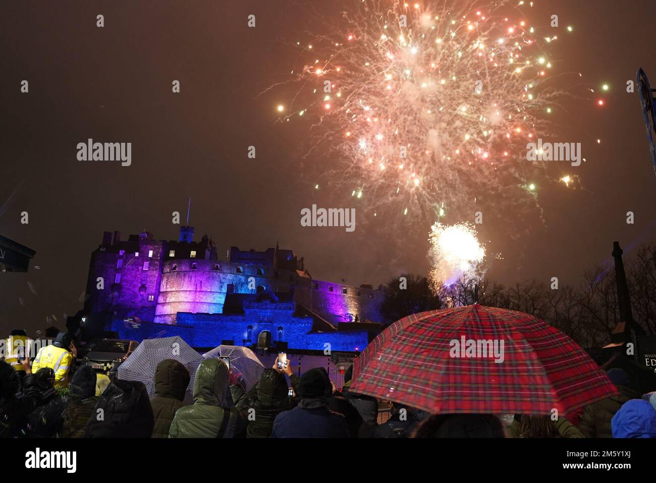 Revellers watch fireworks at Edinburgh Castle during the Hogmanay New ...