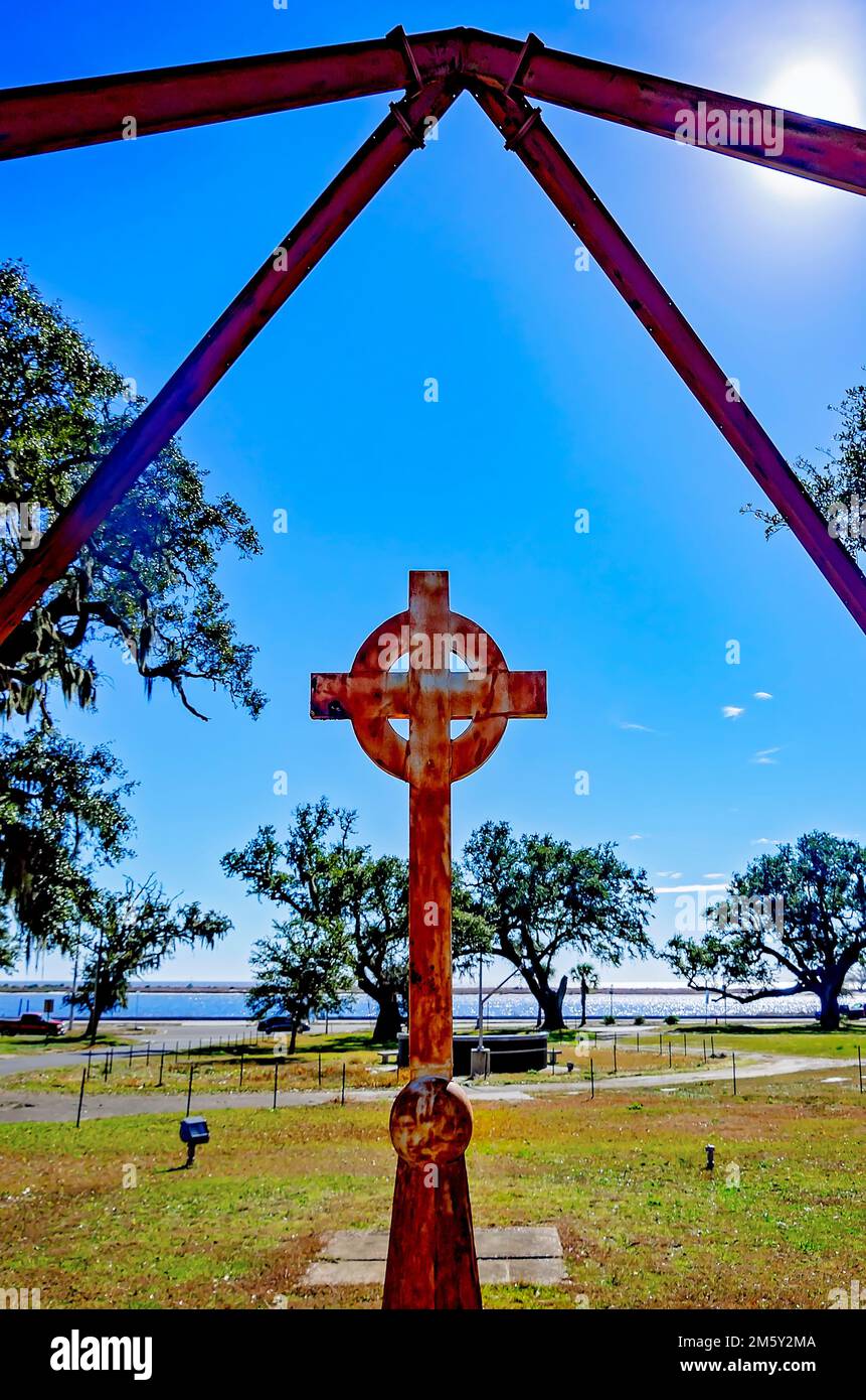 A Hurricane Katrina Memorial stands in front of a Hurricane Camille ...