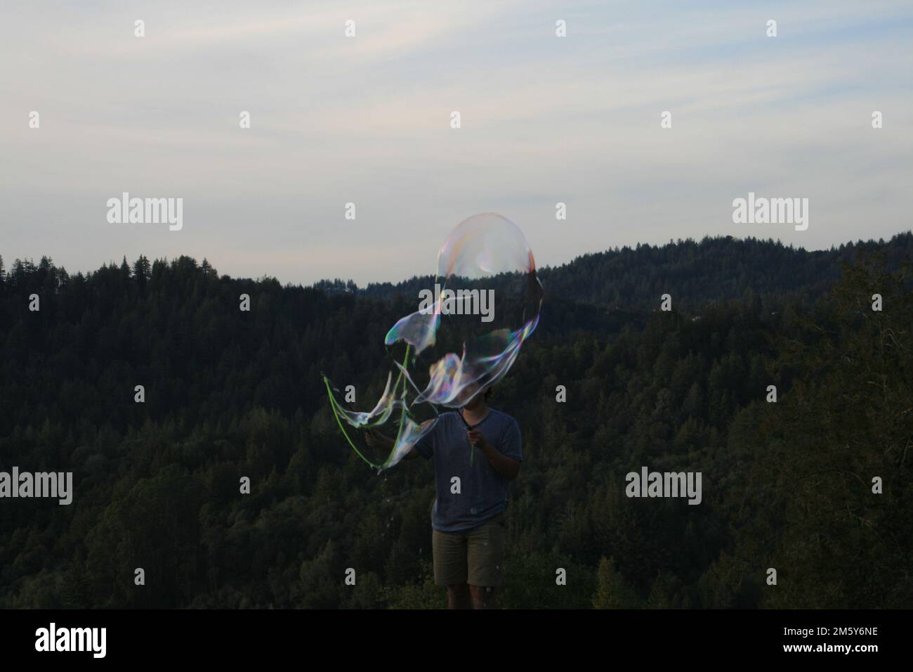 Giant Bubble Popping Stock Photo - Alamy