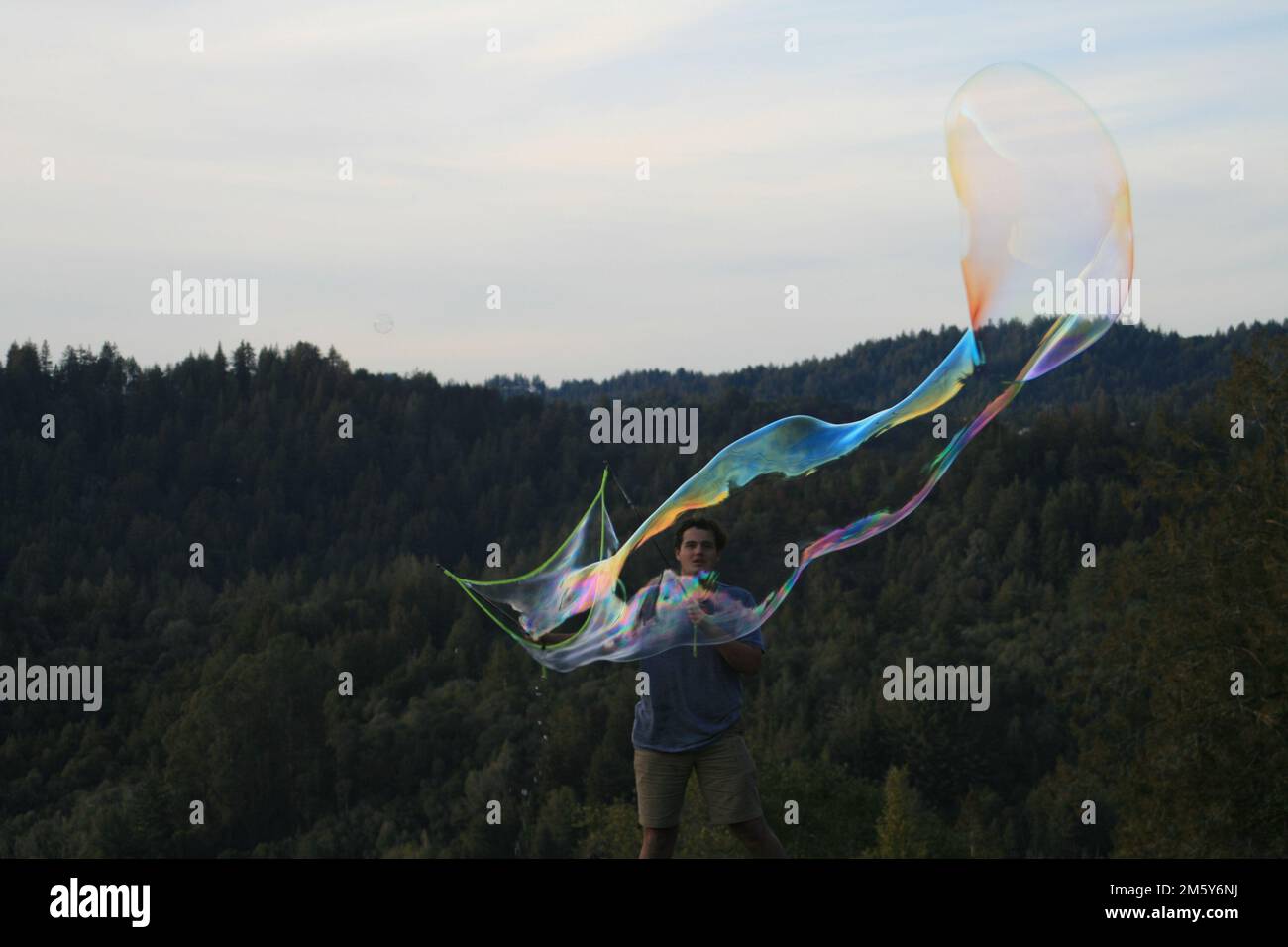 Giant Bubble Popping Stock Photo - Alamy