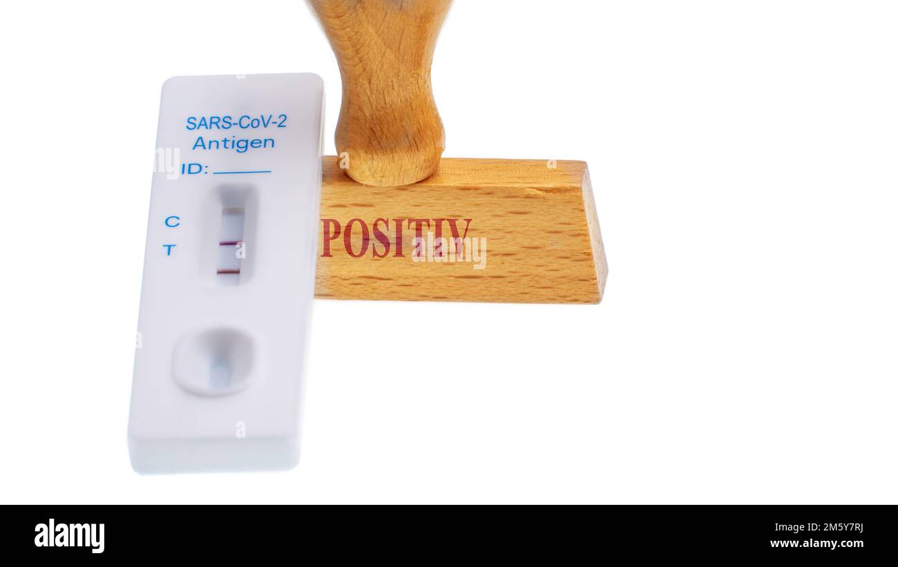A Positive corona antigen rapid test result Stock Photo - Alamy