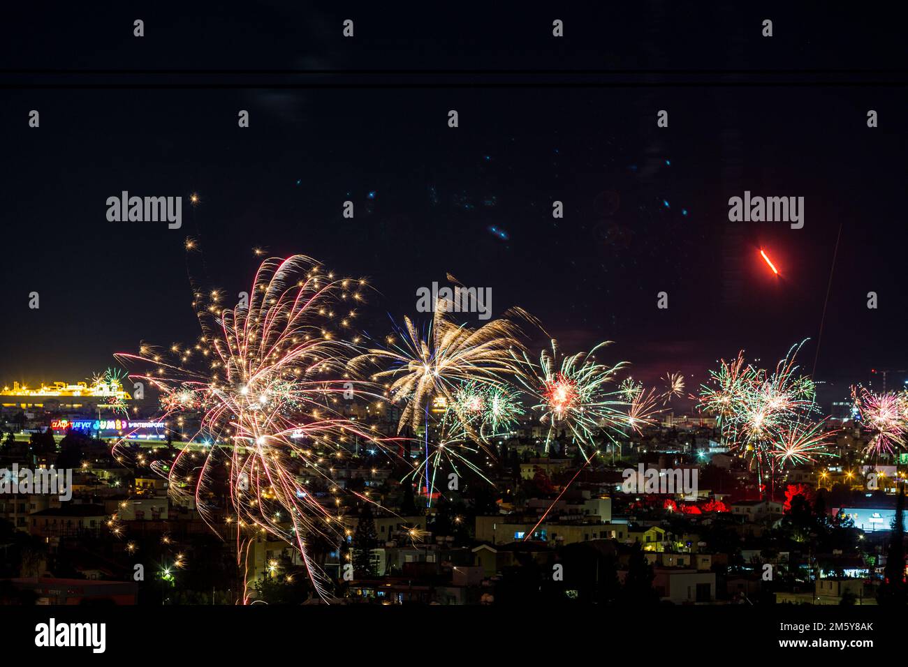 Fireworks are seen over the city during the New Year's celebrations ...