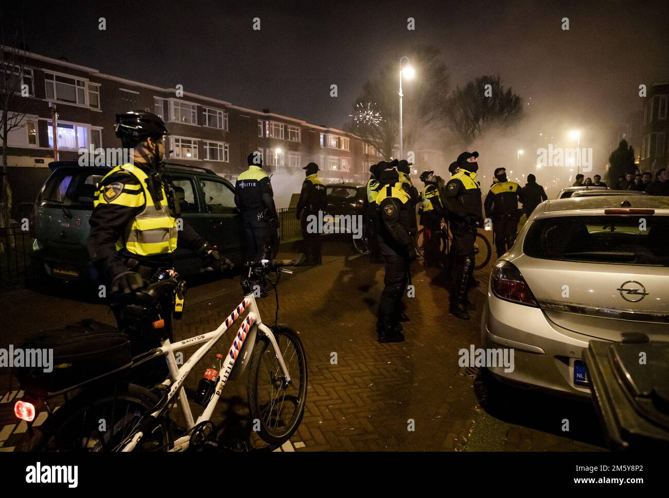 THE HAGUE - Members of the Mobile Unit protect the fire brigade during ...