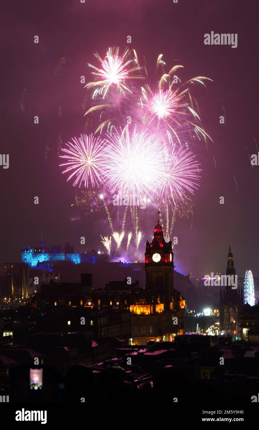 Fireworks explode over Edinburgh Castle during the street party for ...