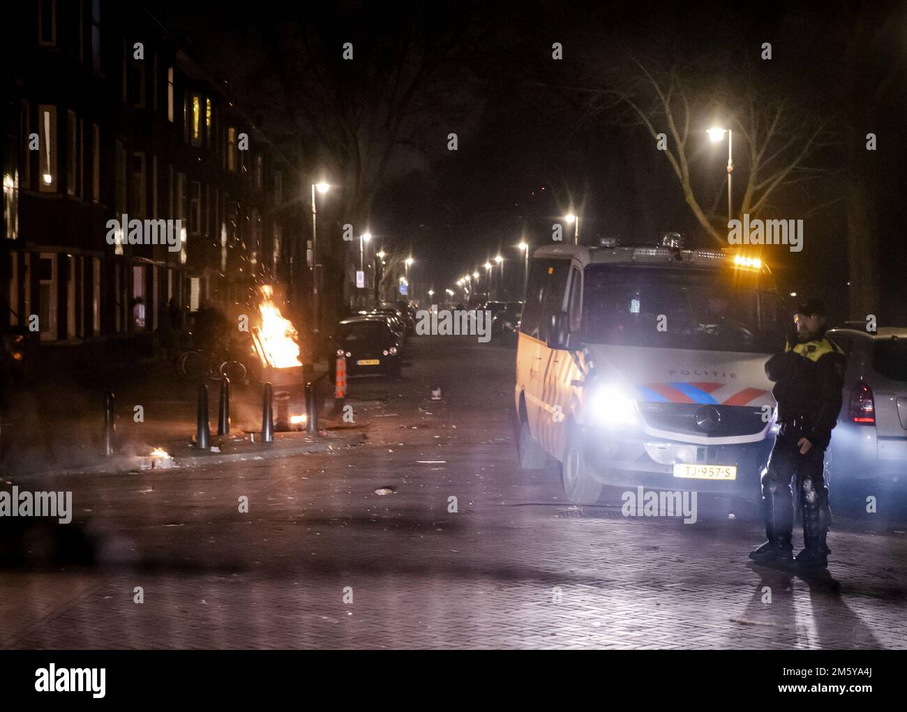 THE HAGUE - Members of the Mobile Unit in action during New Year's Eve ...