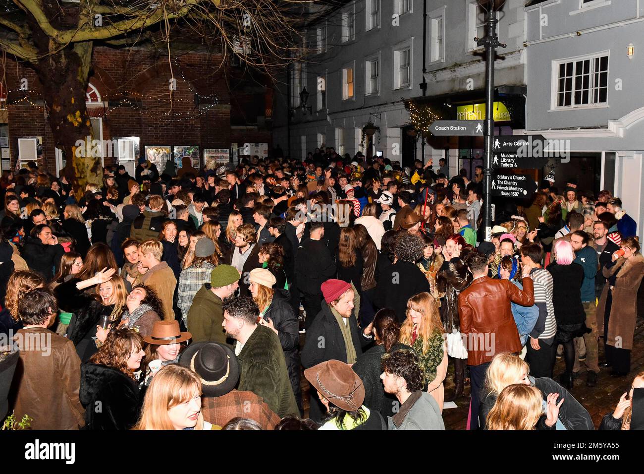 Bridport, Dorset, UK. 31st December 2022. Hundreds of revellers fill ...