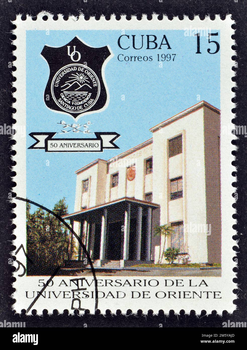 Cancelled postage stamp printed by Cuba, that shows Oriente University, 50th Anniversary of the ...
