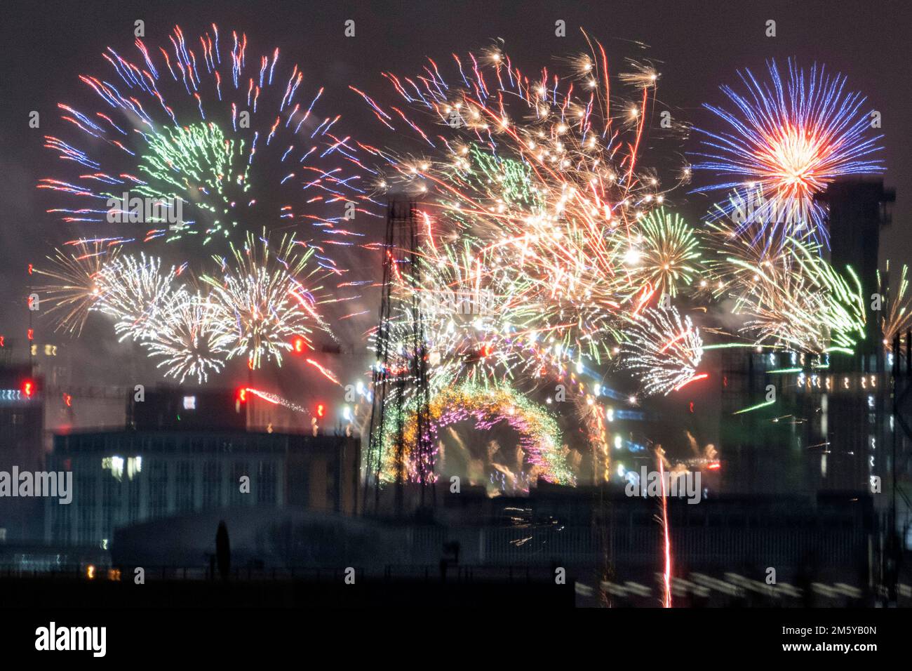 01 January 2023. London, UK. Fireworks light up the London skyline ...