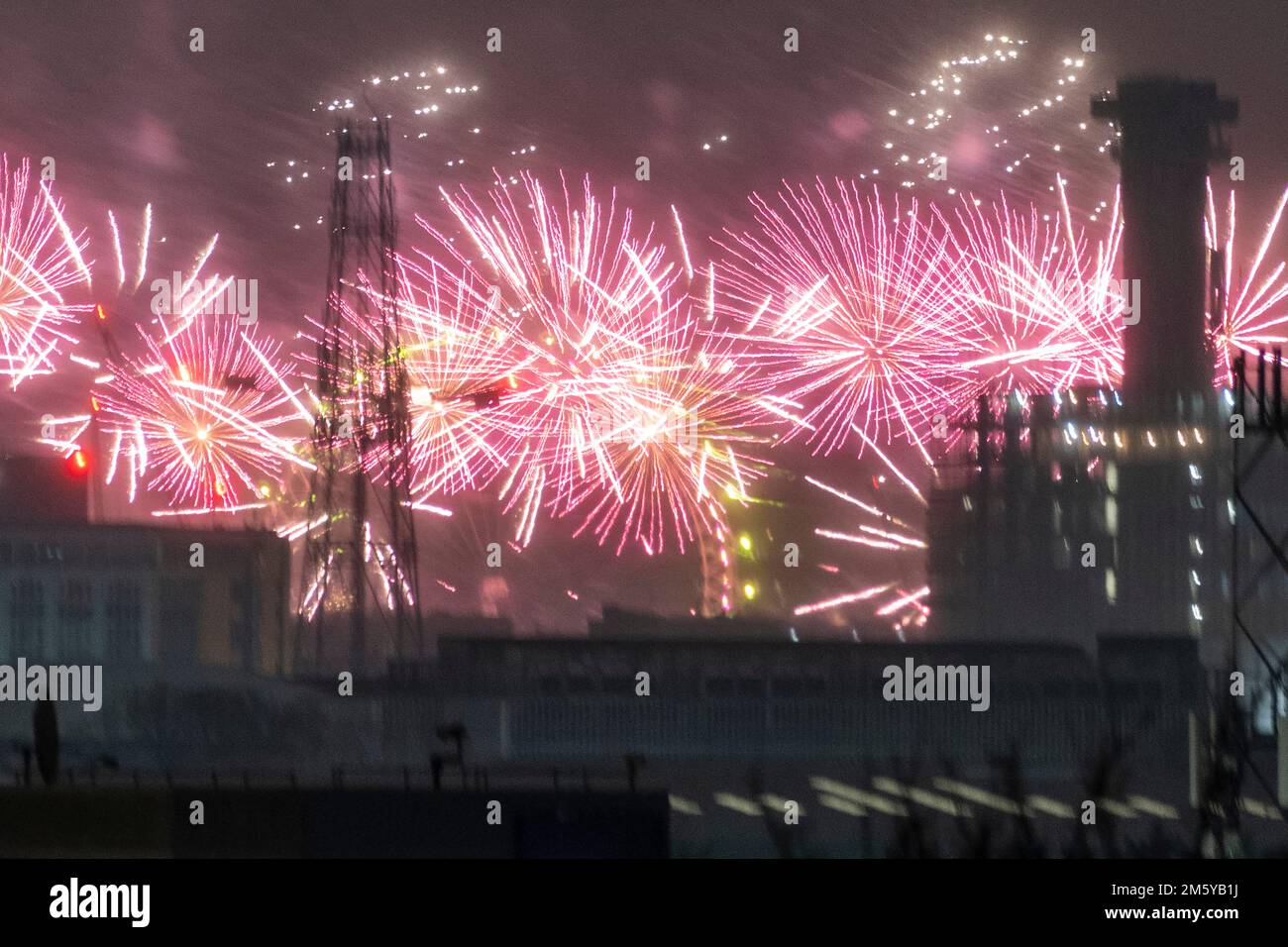 01 January 2023. London, UK. Fireworks light up the London skyline ...