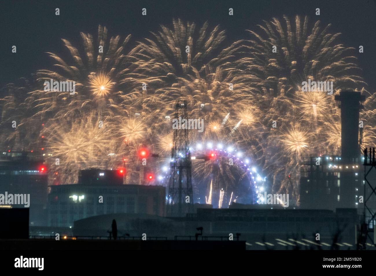 01 January 2023. London, UK. Fireworks light up the London skyline ...