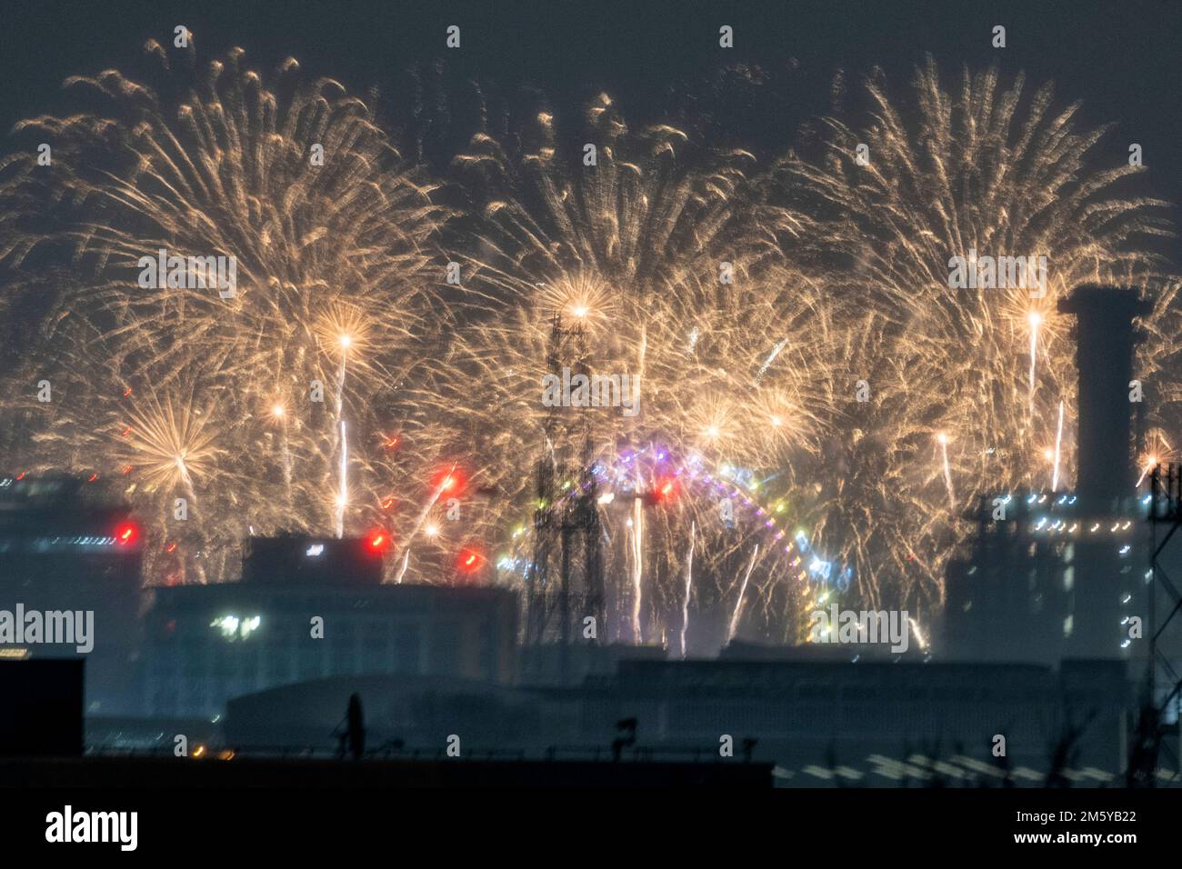 01 January 2023. London, UK. Fireworks light up the London skyline ...