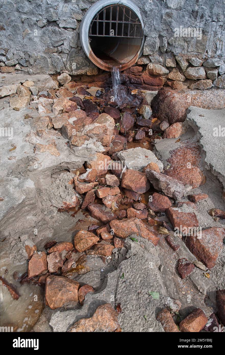 concrete outlet culvert pipe drainage to the beach Stock Photo - Alamy