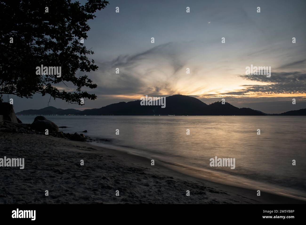 slow exposure shot at the late evening sky at the beach Stock Photo - Alamy
