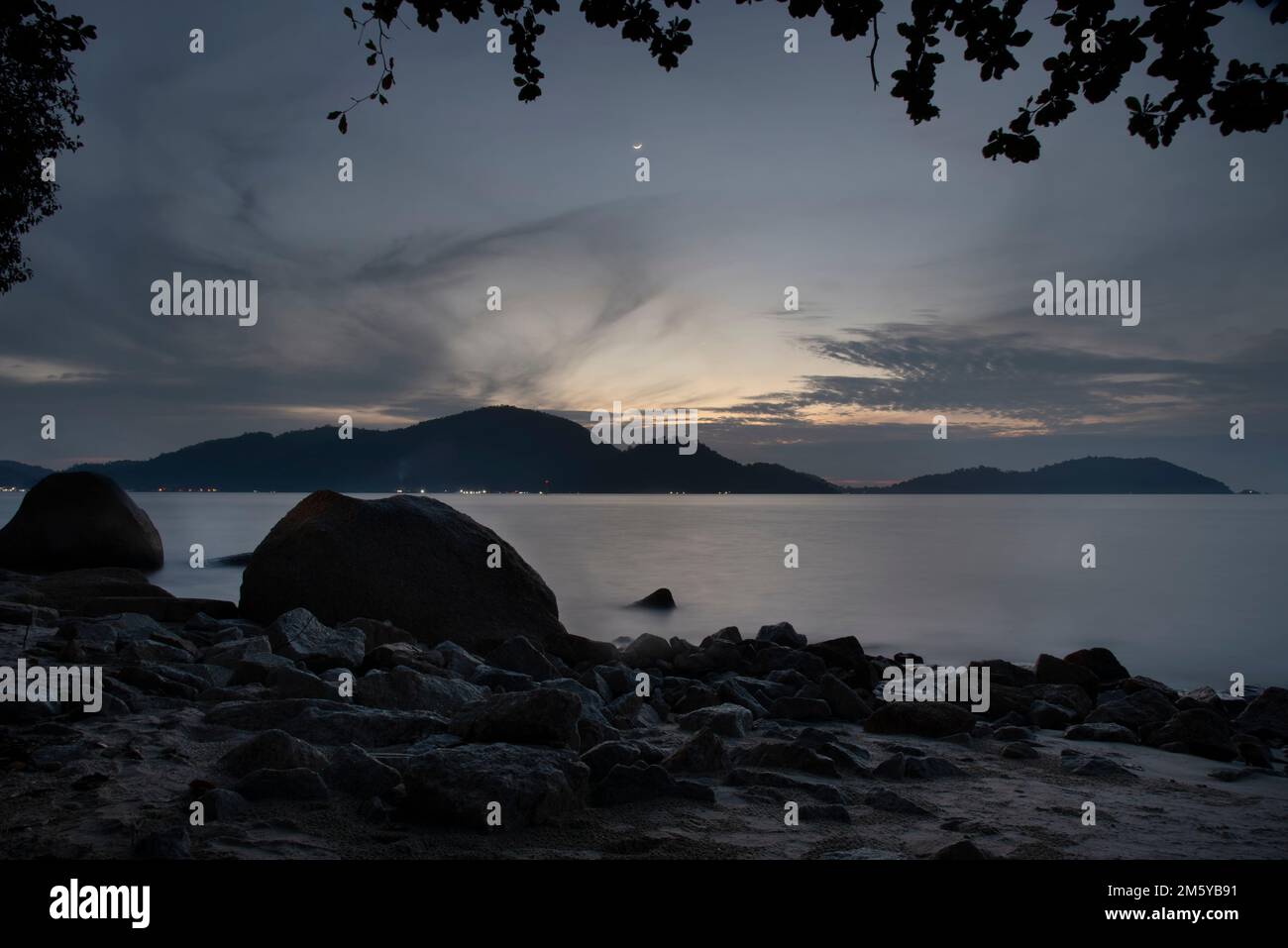 slow exposure shot at the late evening sky at the beach Stock Photo - Alamy
