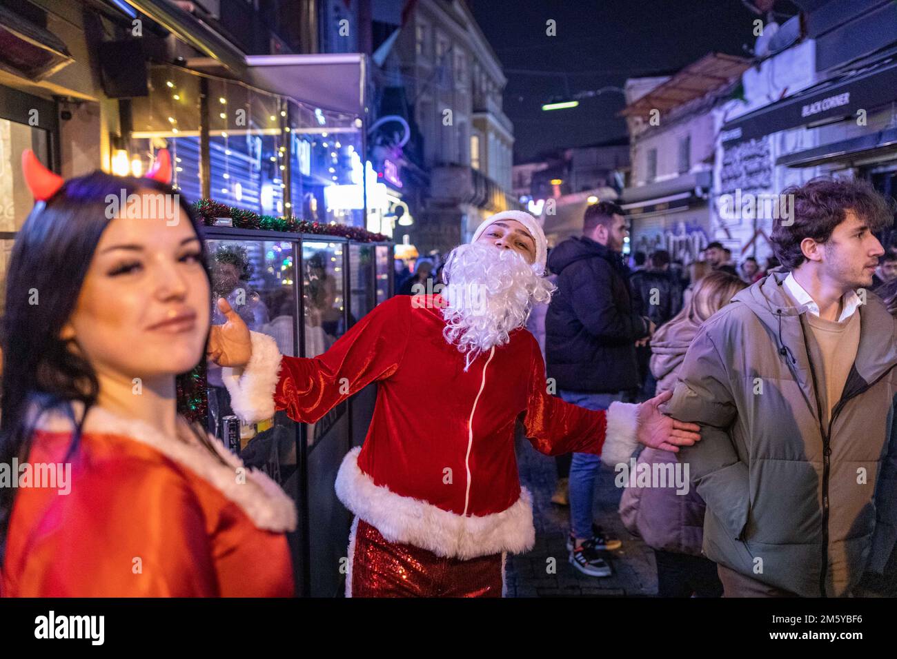 Istanbul, Turkey. December 31, 2022: A man dressed as Santa Claus poses ...
