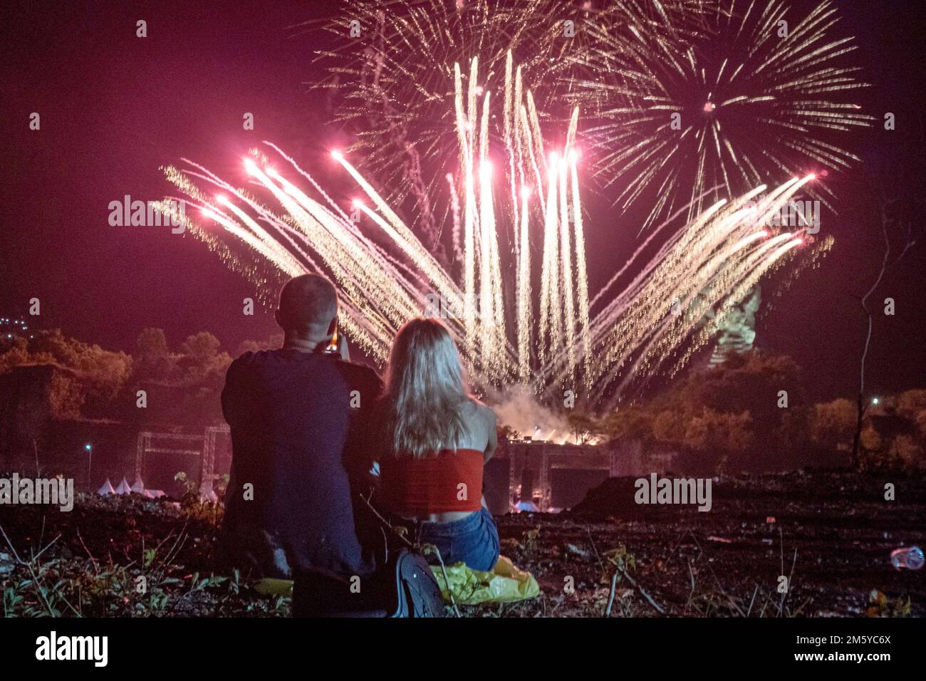Bali, Indonesia. 31st Dec, 2022. People watch fireworks during New Year ...