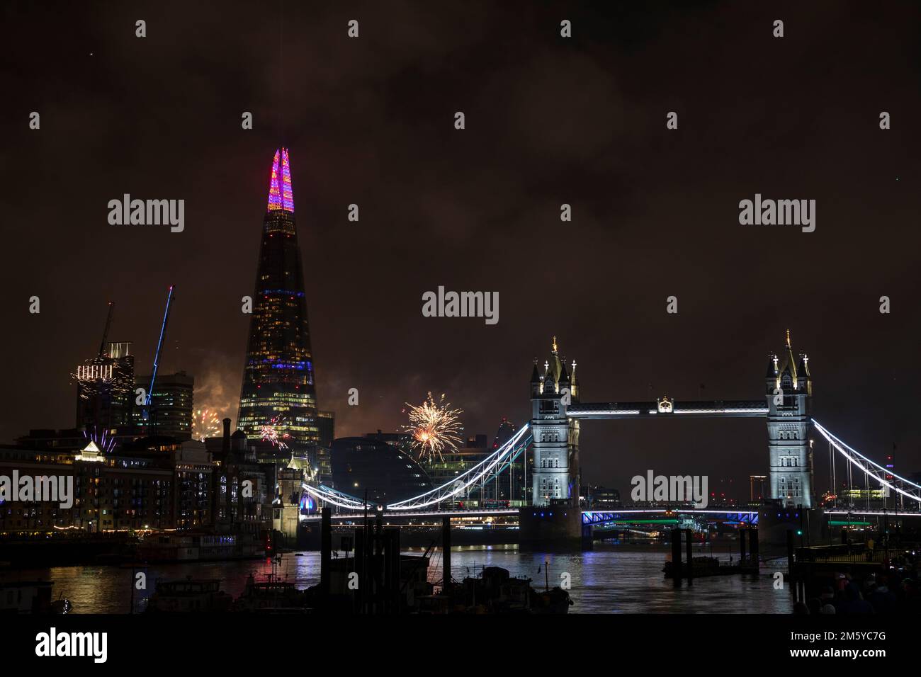 The Shard, London, UK. 1st Jan 2023. New Year celebrations commence with fireworks and a light ...